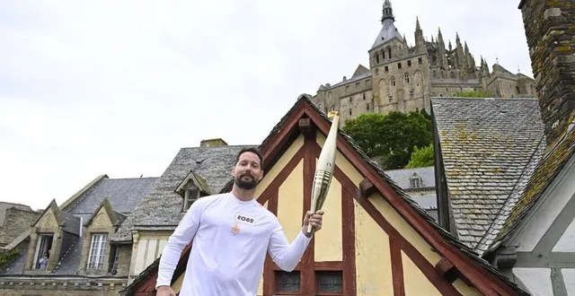 Des relayeurs conquis par leur passage au Mont Saint-Michel . Sport ...